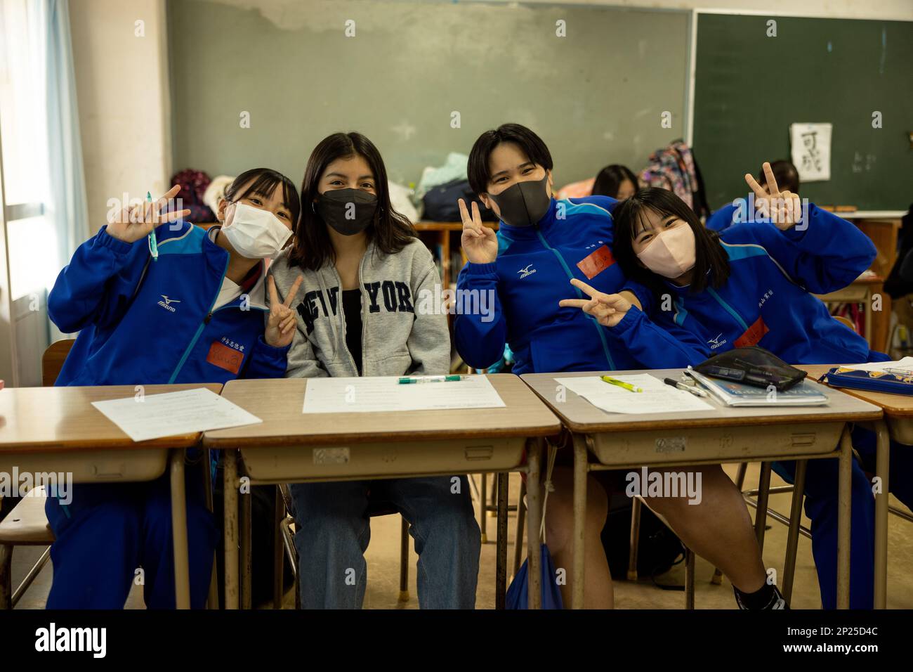 American and Japanese high school students pose for a group photo ...