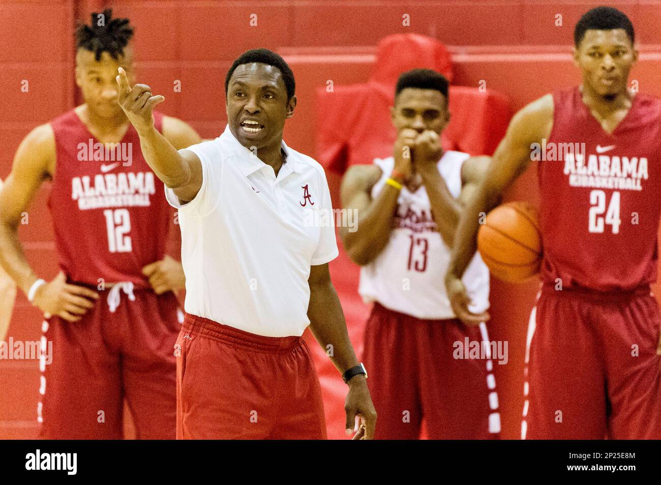 Alabama basketball coach Avery Johnson works with his players during ...