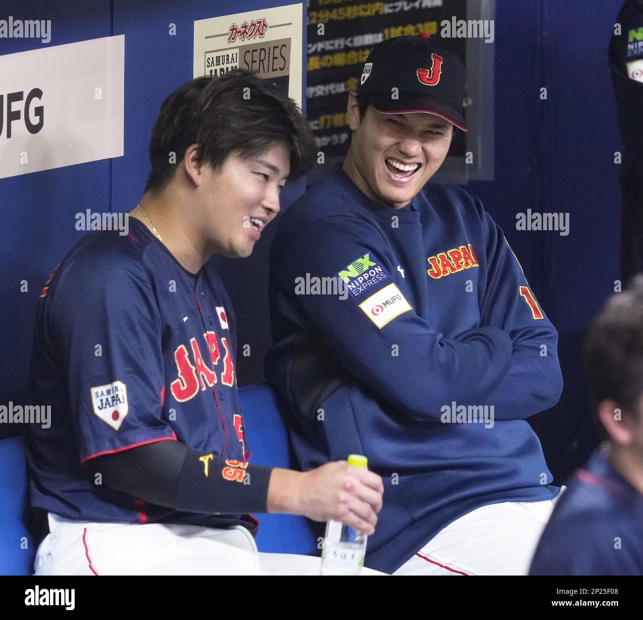 Shohei Ohtani (R) of Japan's national baseball team chats with teammate ...