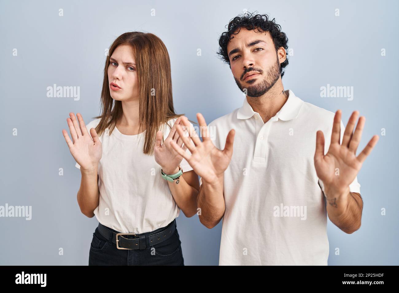 Woman pushing man away rejection hi-res stock photography and images ...