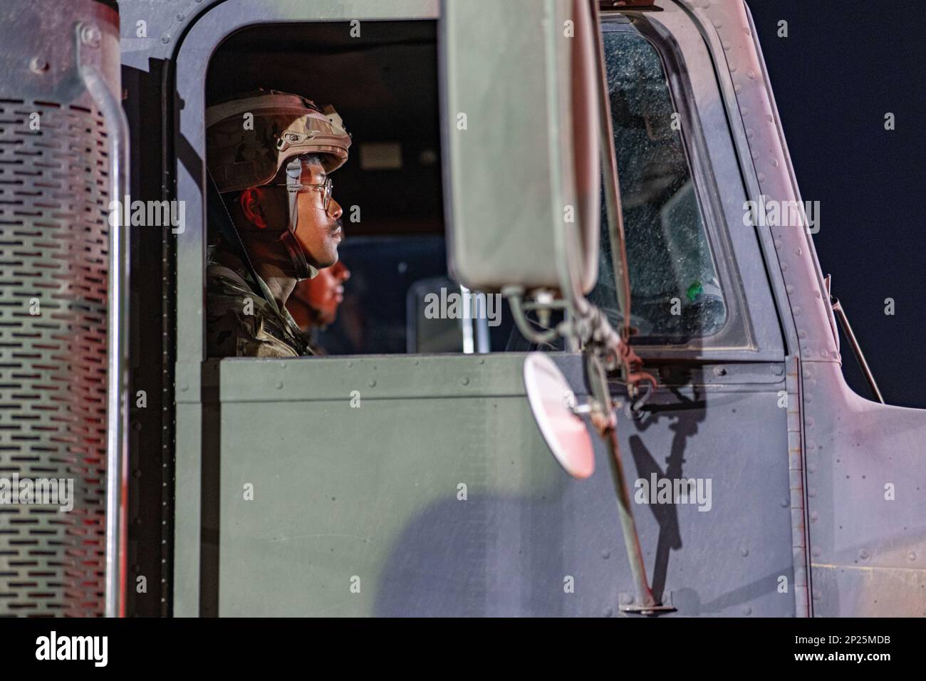 U.S. Army Spc. Fernando Martinez, the driver, and Sgt. 1st Class Jason ...