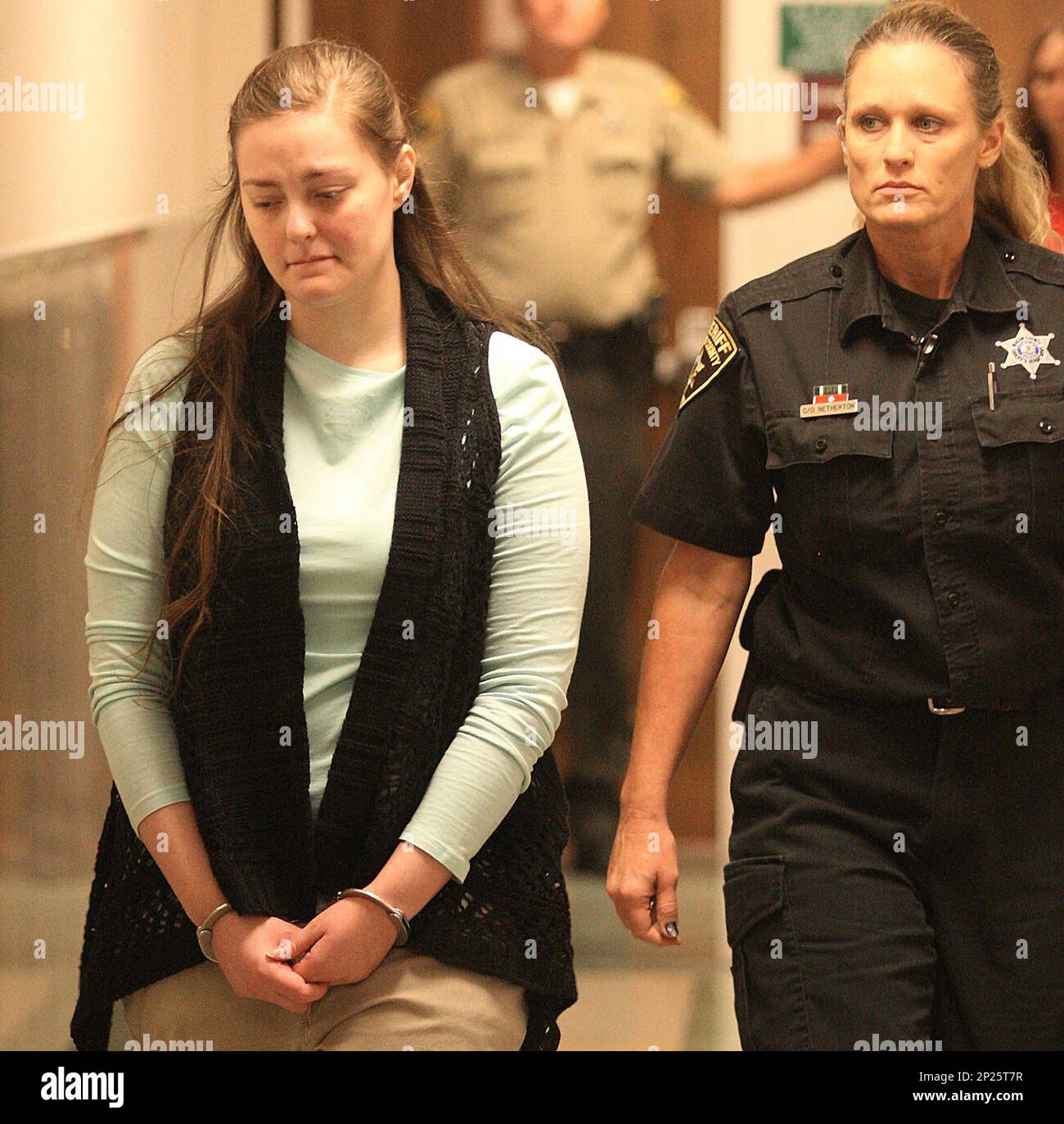 In this Nov. 2, 2015 photo, Katrina Giles is escorted out of the ...