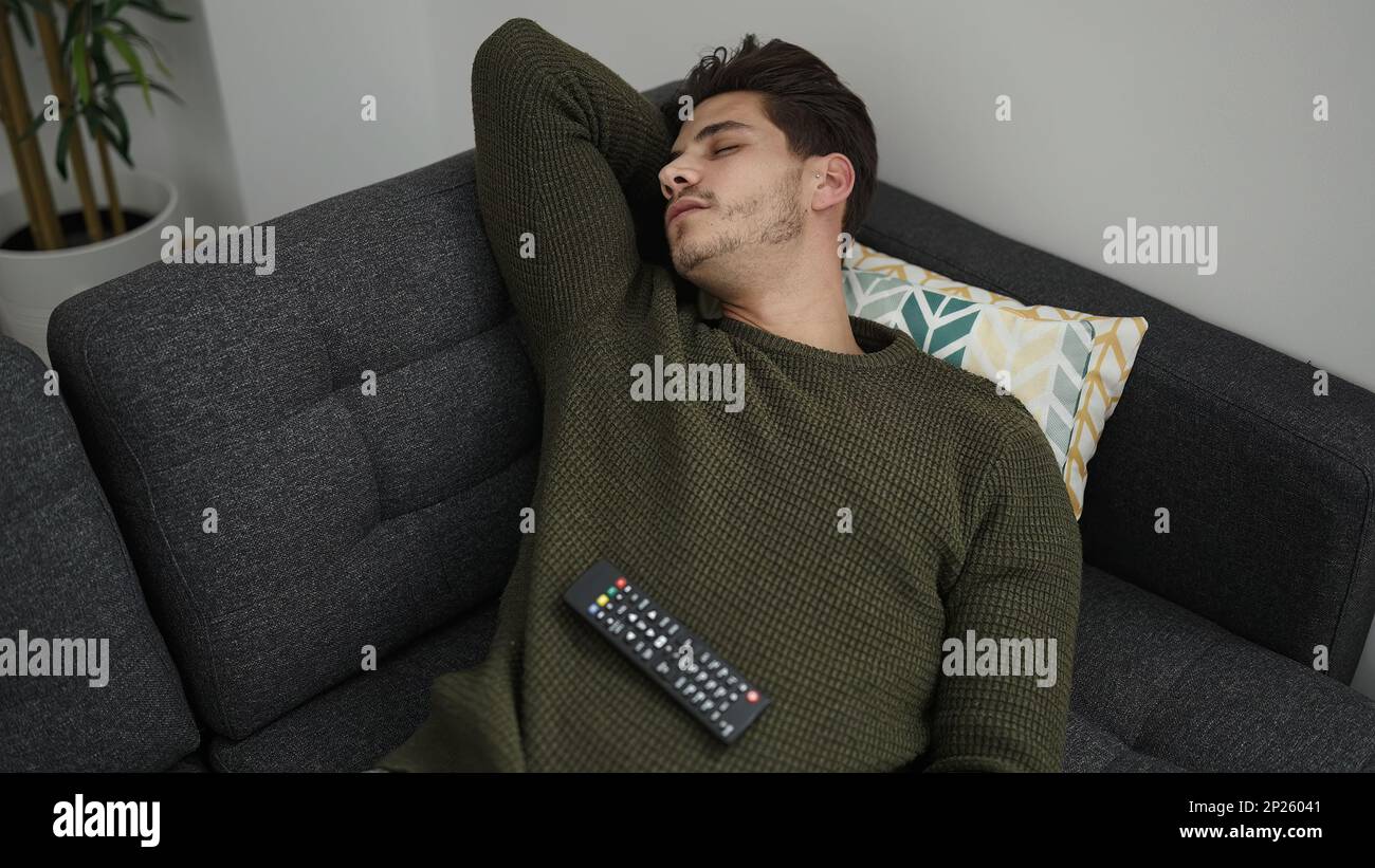 Remote control man sleep hi-res stock photography and images - Alamy