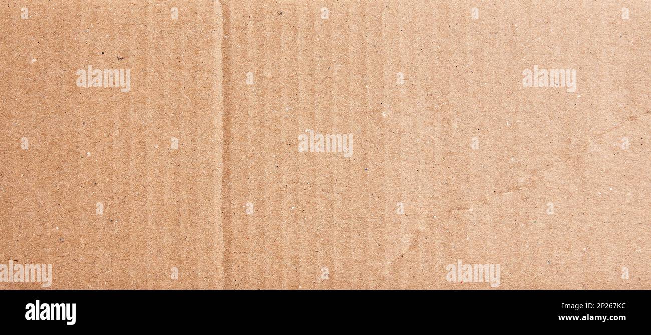 Brown cardboard carton material texture background Stock Photo - Alamy