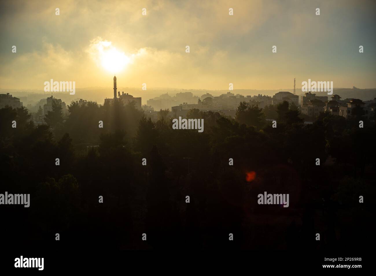 Ramallah Cityscape at Dawn with Minaret Directly in the Sunset, High ...