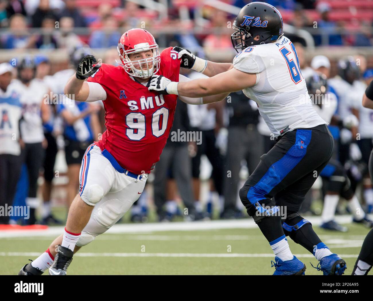 31 October 2015: SMU Mustangs defensive end Zach Wood (#90) battles ...