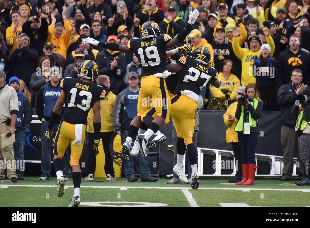 31 October, 2015: Iowa players celebrate after Iowa free safety Jordan ...