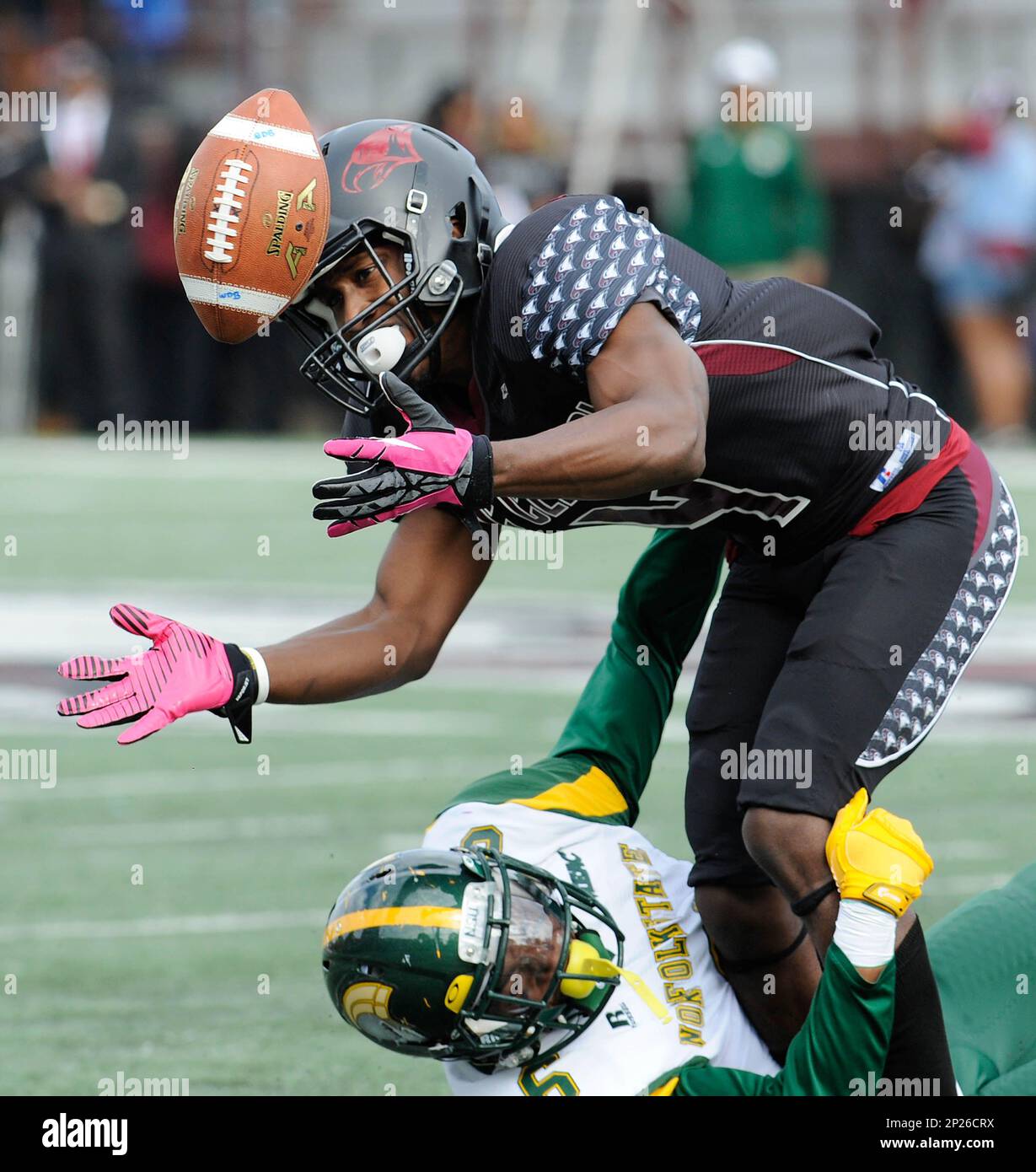 N.C. Central's LaVontis Smith (4) fumbles the ball as he's tackled by ...