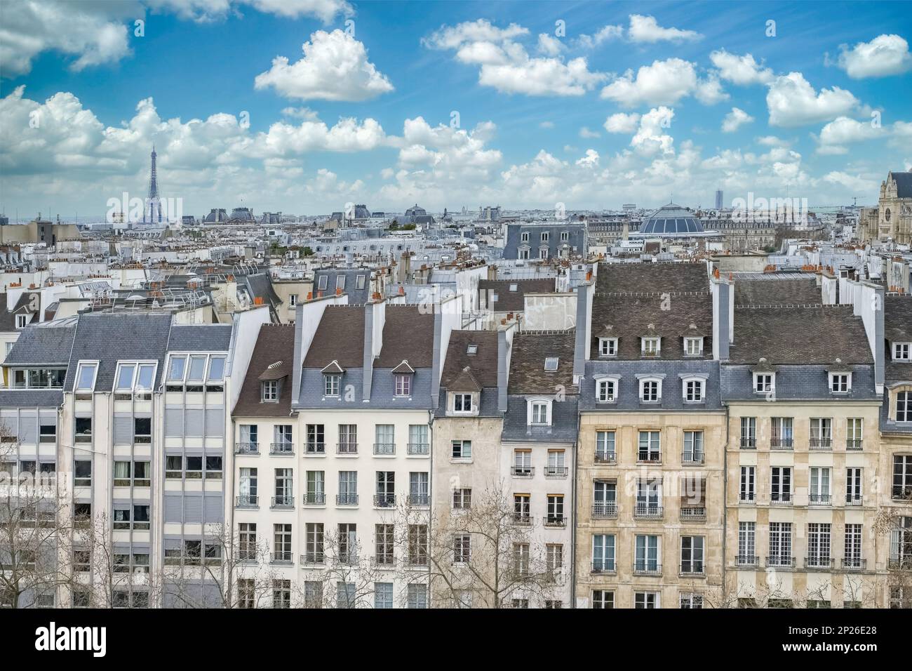Paris, typical roofs in the Marais, aerial view with the Eiffel tower ...
