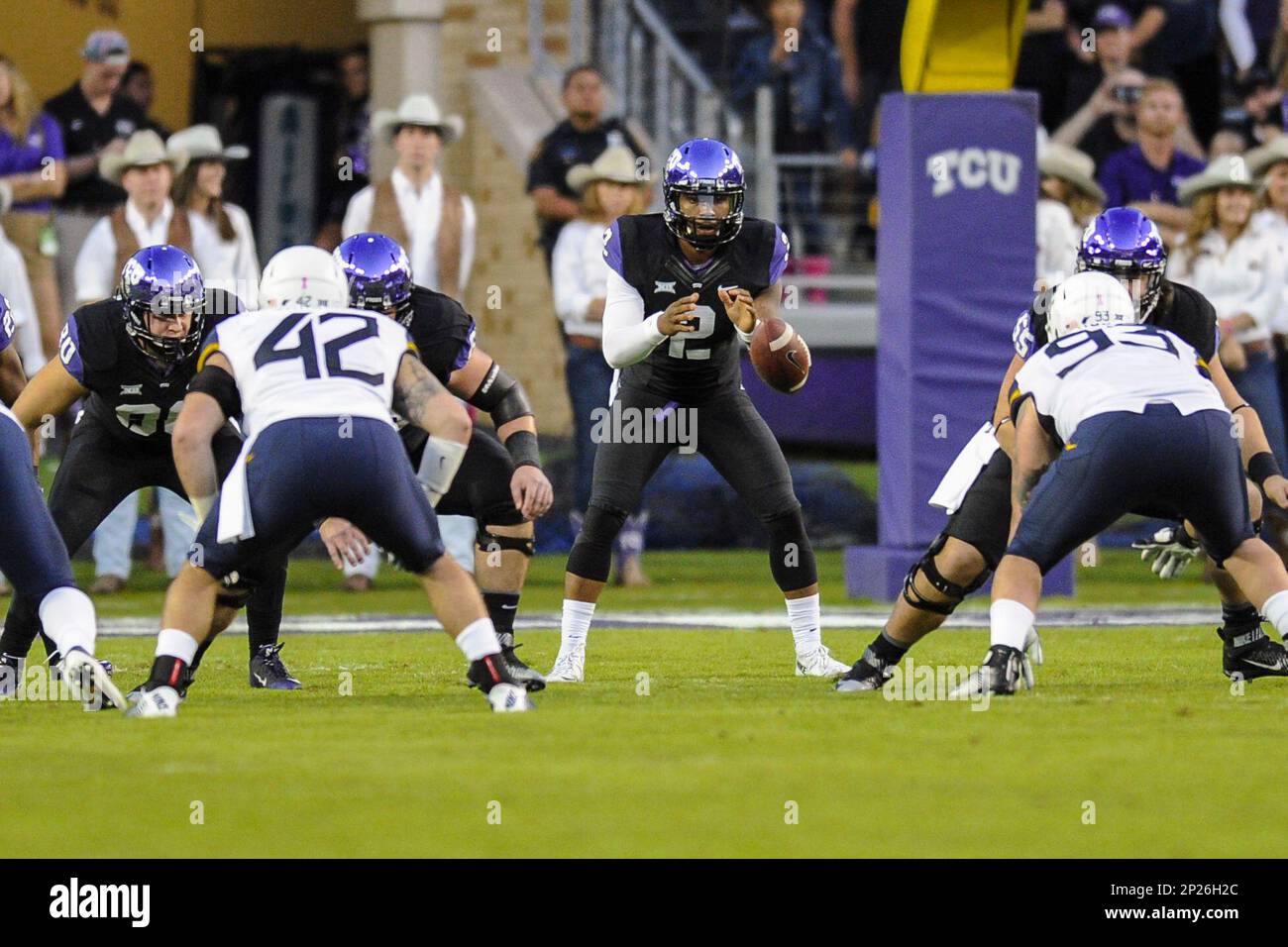 TCU quarterback Trevone Boykin (2) takes the snap from center during an ...