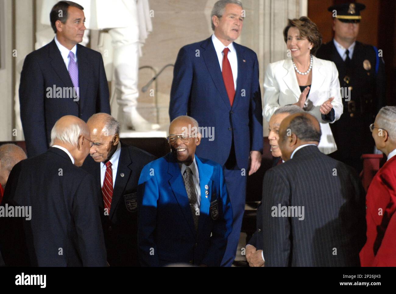 Tuskegee Airmen arrive in the Capitol Rotunda before a Congressional ...