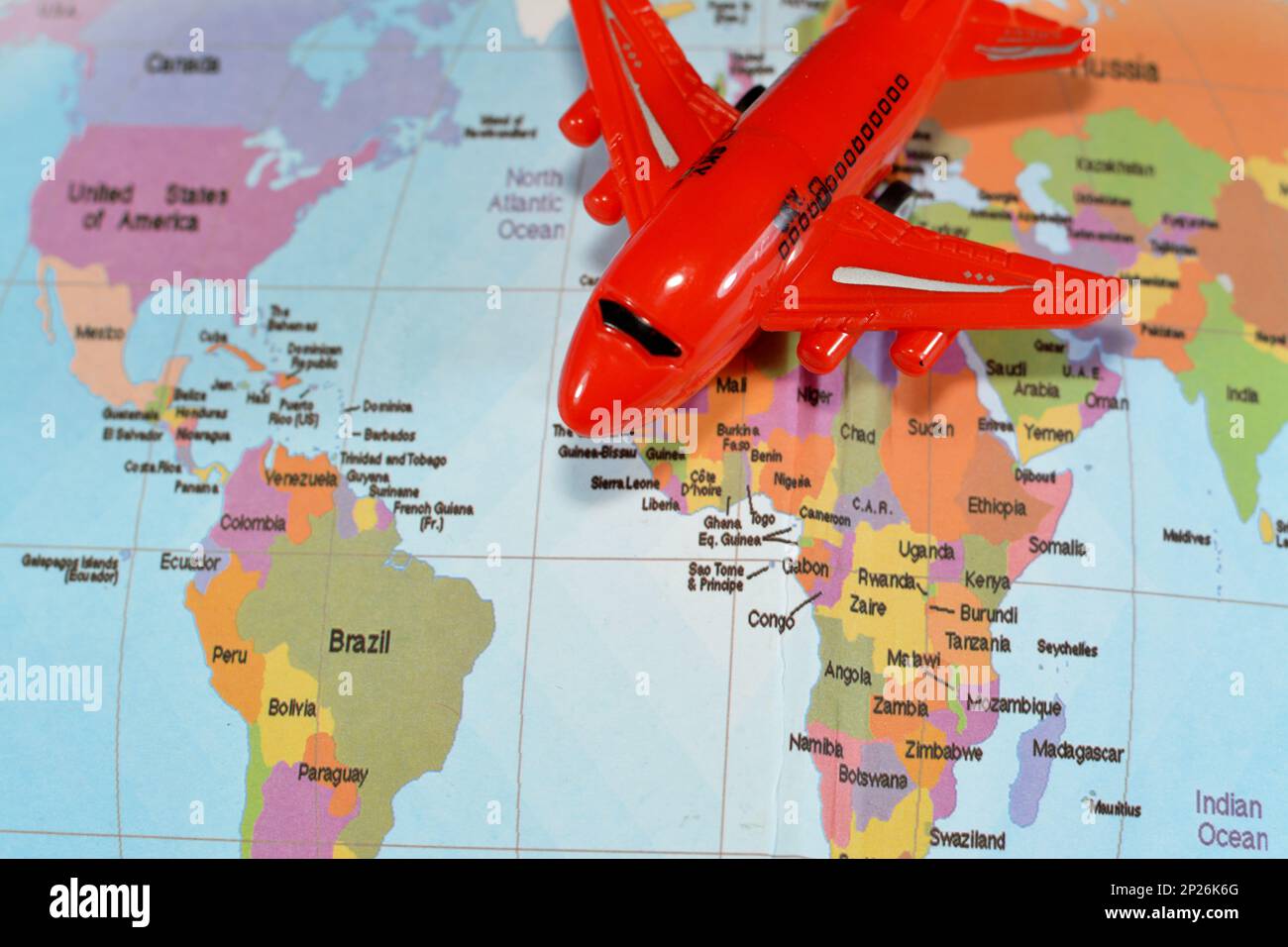 Colorful world map with airplane on it with the continents Africa ...