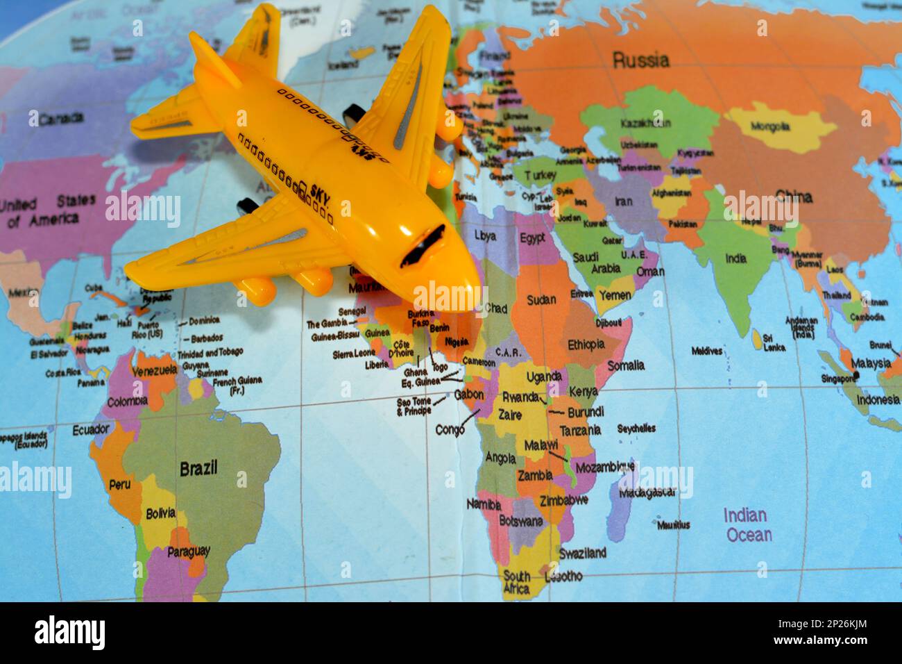 Colorful world map with airplane on it with the continents Africa ...