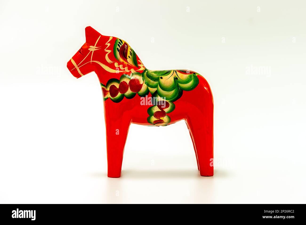 A Red, Swedish Wooden Dala Horse with a white background Stock Photo ...