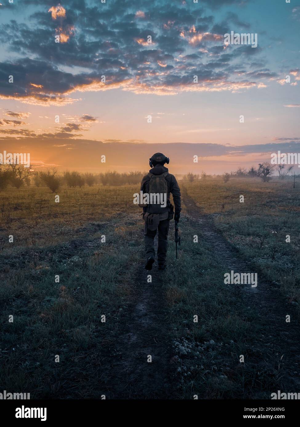 Modern soldier walks towards the East on a mission of duty and ...