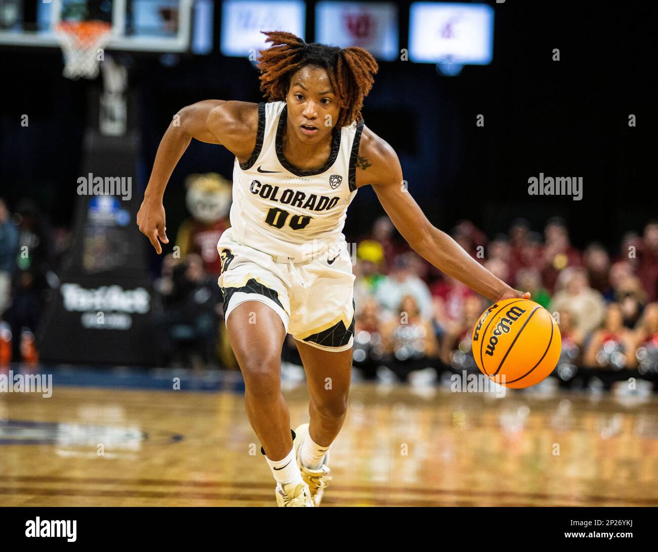 LasVegas, NV, USA. 03rd Mar, 2023. A. Colorado guard Jaylyn Sherrod (00)drives to the hoop ...