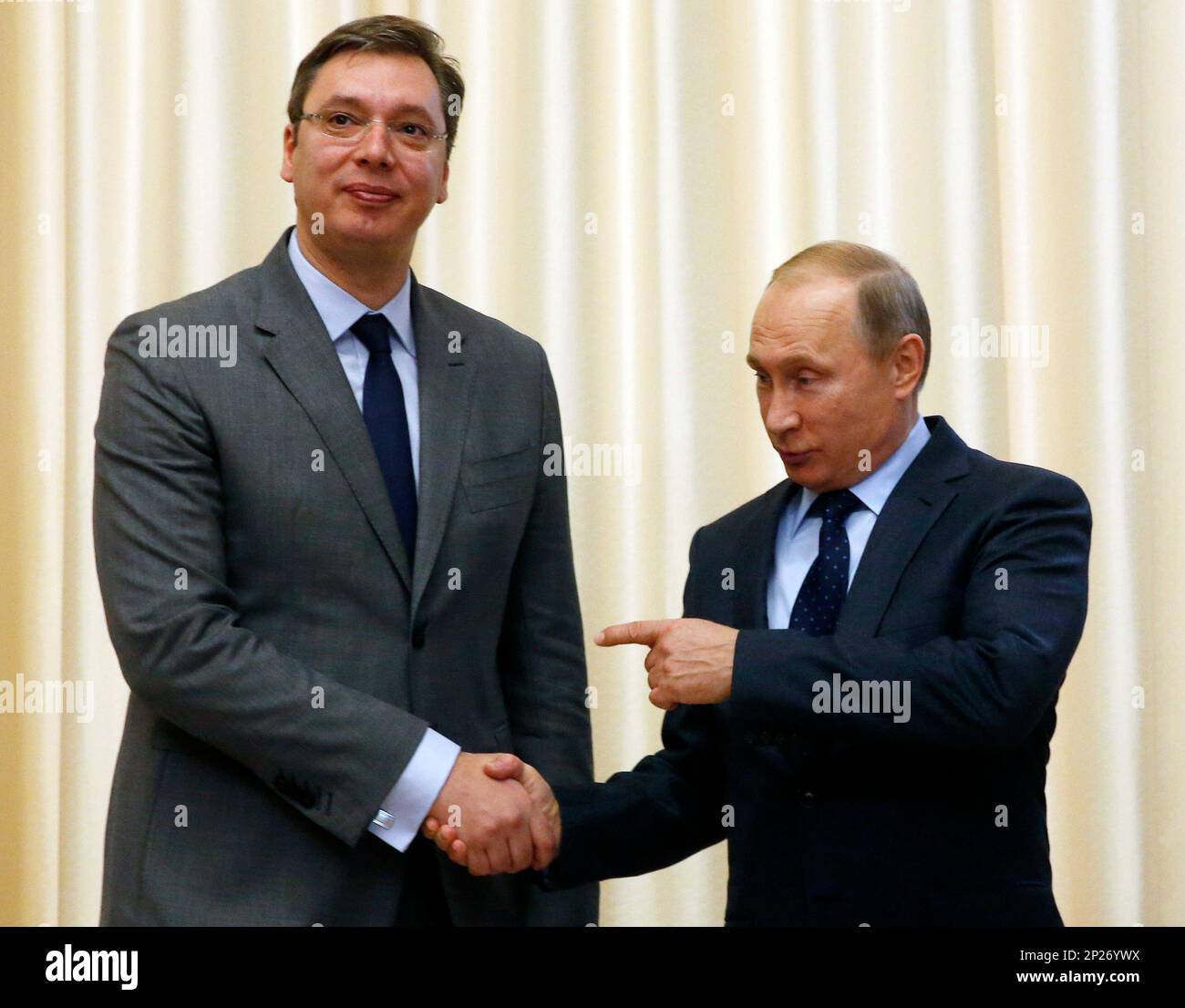 Russian President Vladimir Putin, right, and Serbian Prime Minister ...