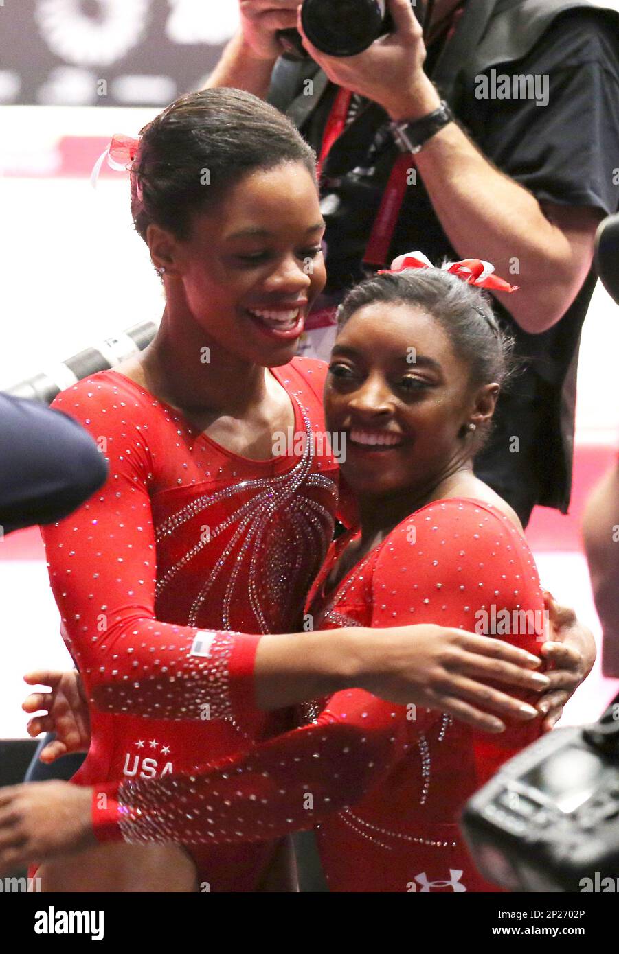 Teenager Simone Biles (L) and Gabby Douglas of the United States ...