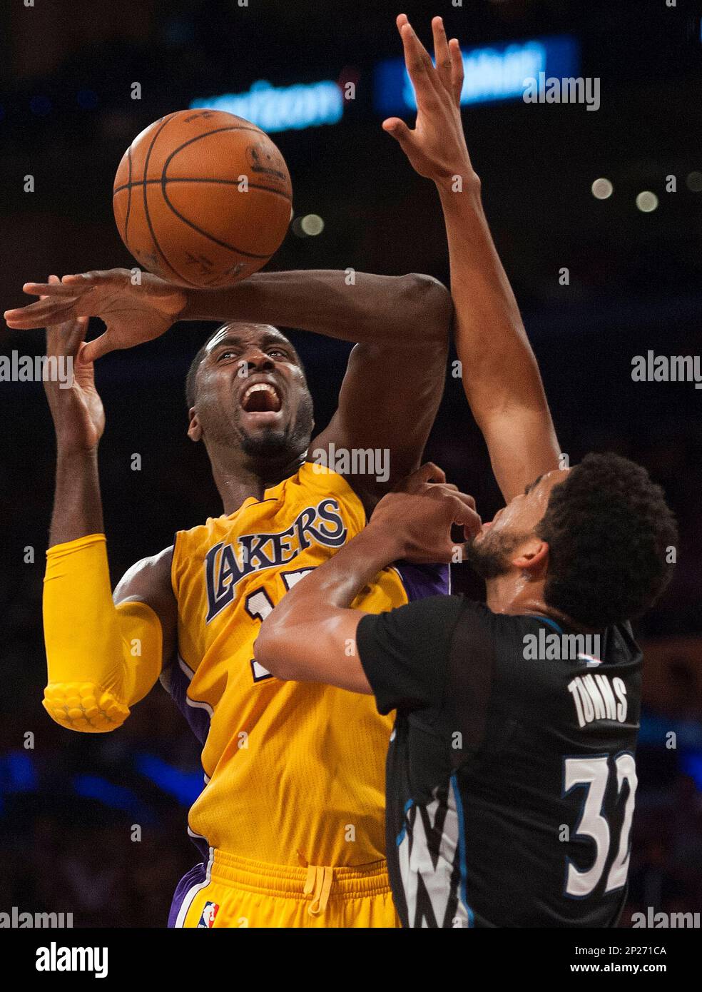 Los Angeles Lakers' Roy Hibbert is fouled by Minnesota Timberwolves ...