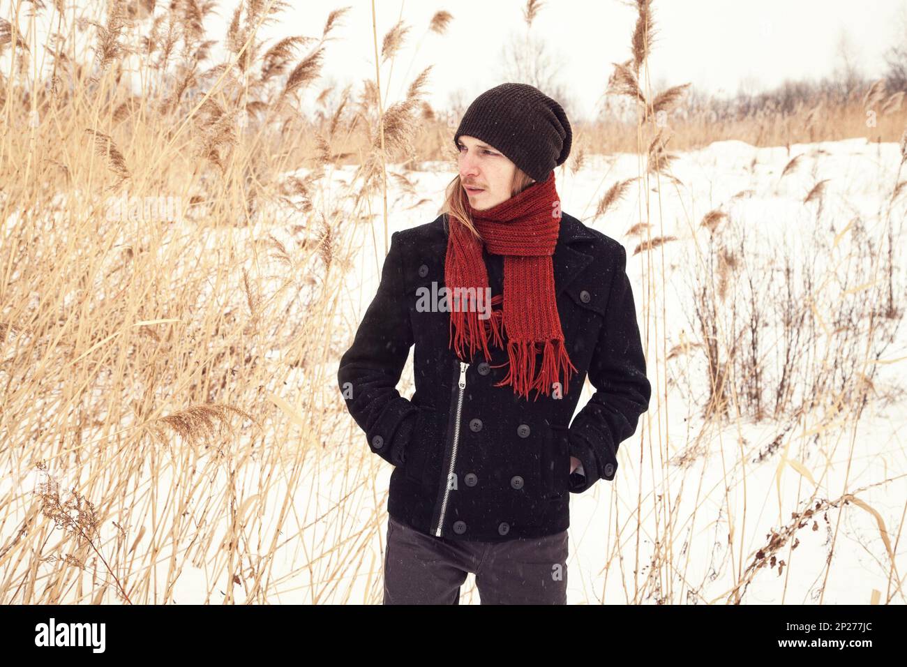 Sad man in snow hi-res stock photography and images - Alamy