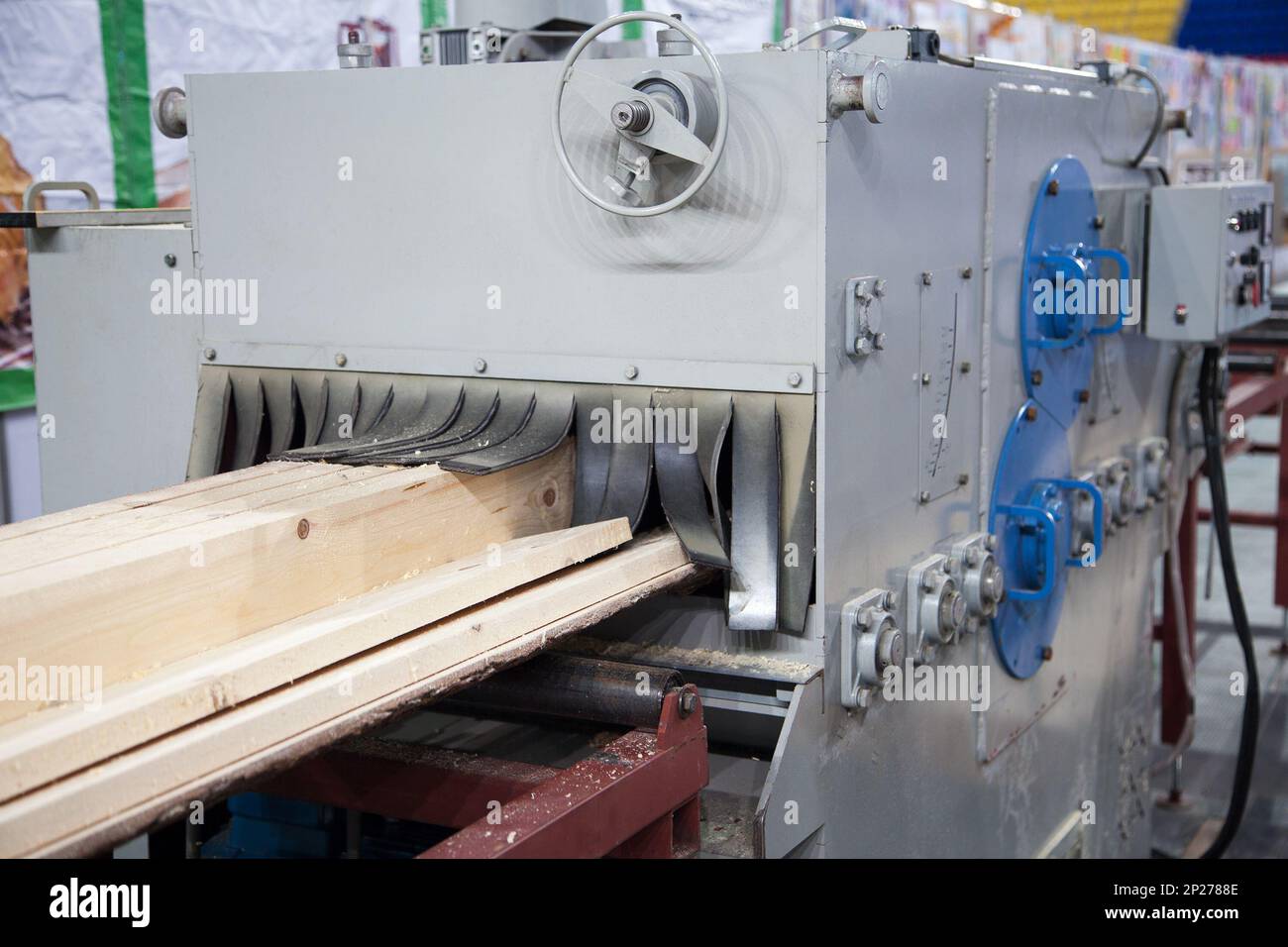 Big industrial sawmill cutting wood into boards. Woodworking facility ...