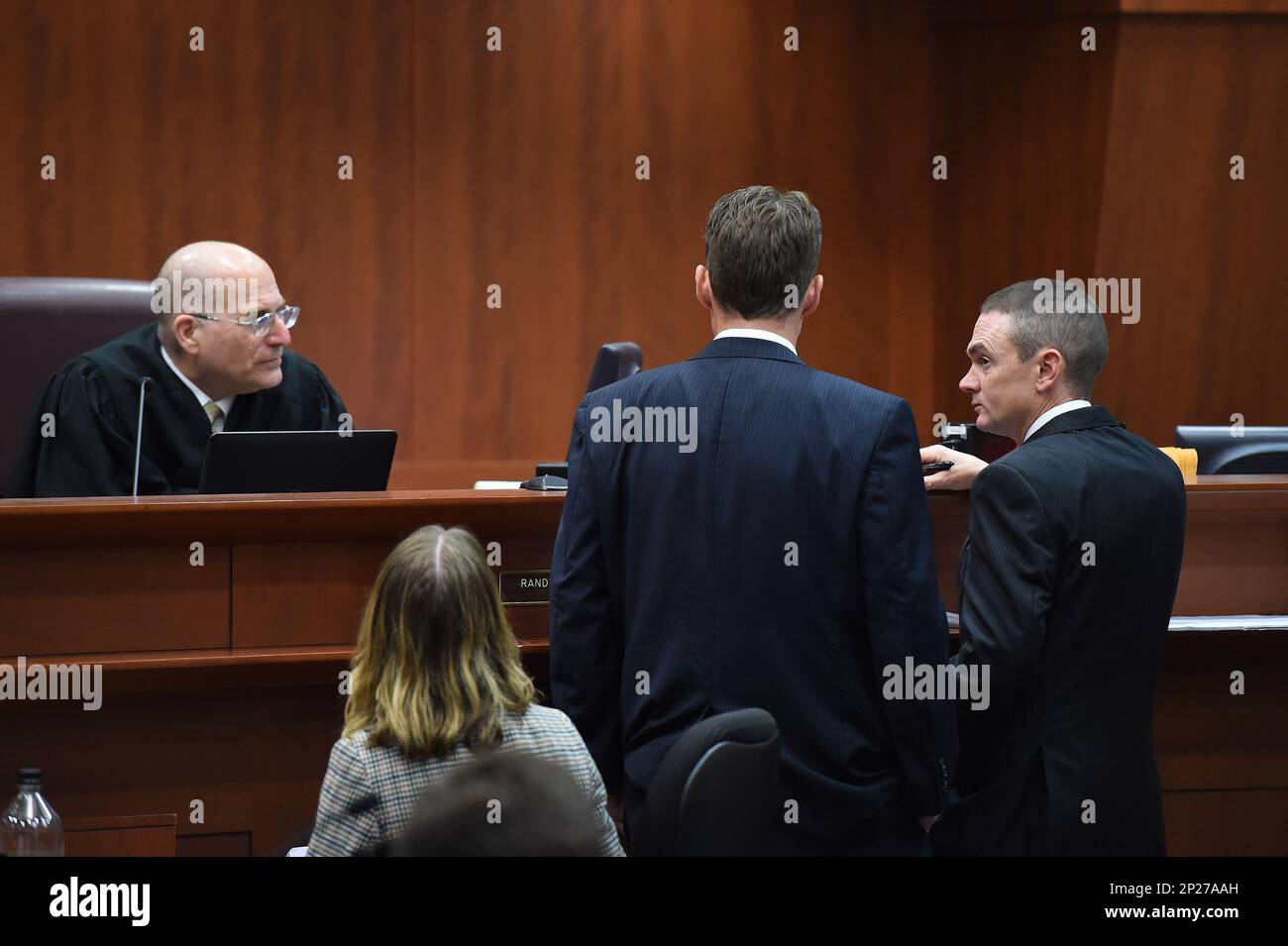 Judge Randy I. Bellows, left, listens to prosecuting attorney, Bryan ...