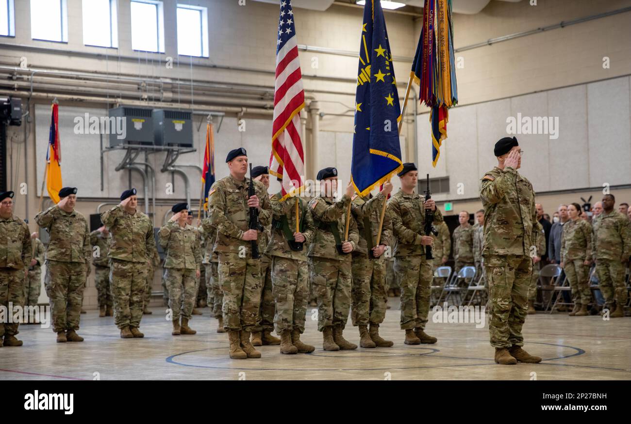 Soldiers with the 38th Infantry Division present arms during a change ...