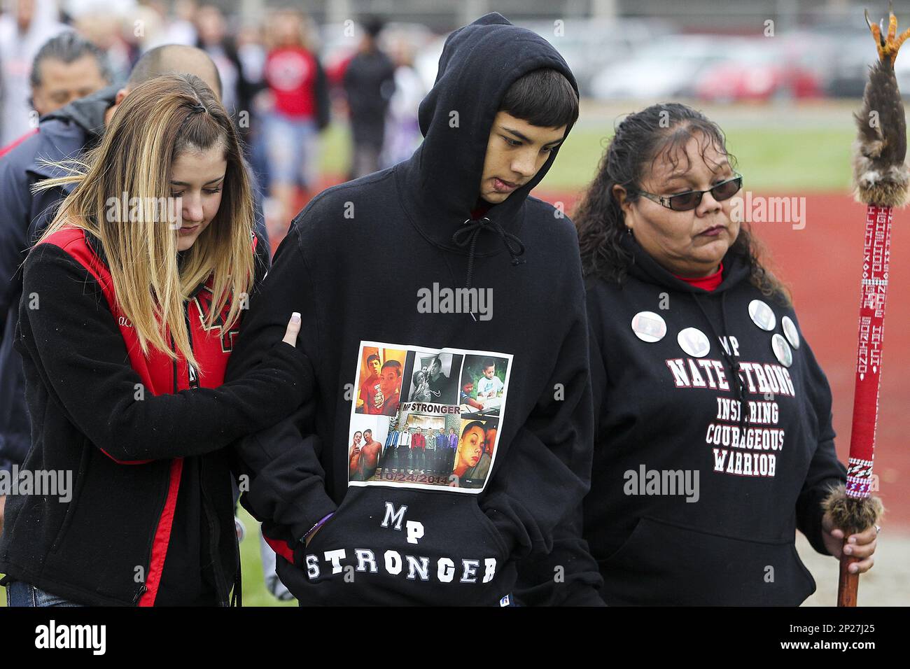 Marysville Pilchuck school shooting survivor Nate Hatch, center, his ...