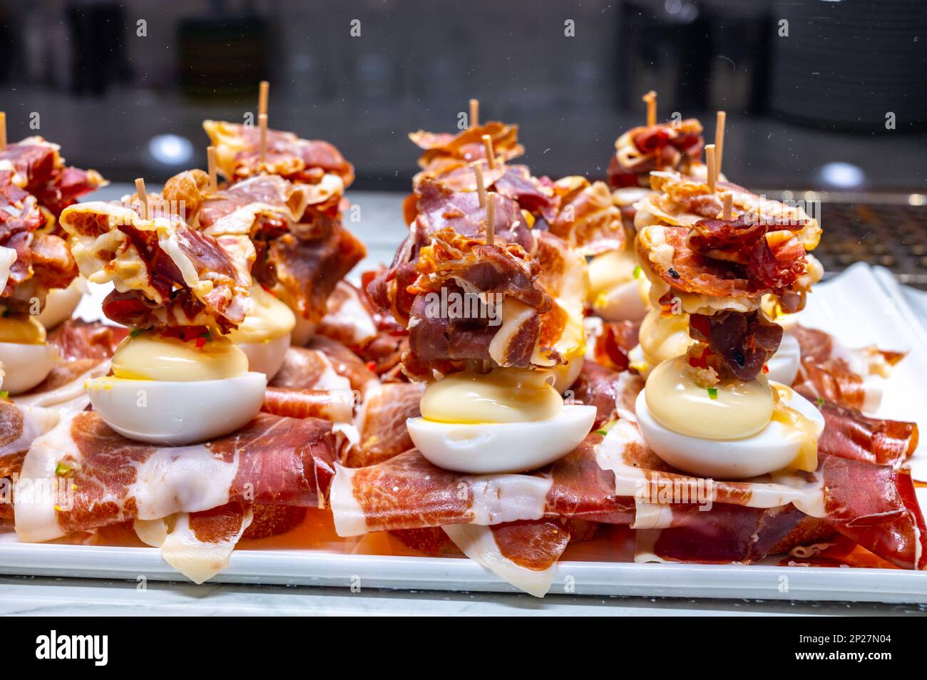 Typical snack of Basque Country, pinchos or pinxtos, small piece of ...