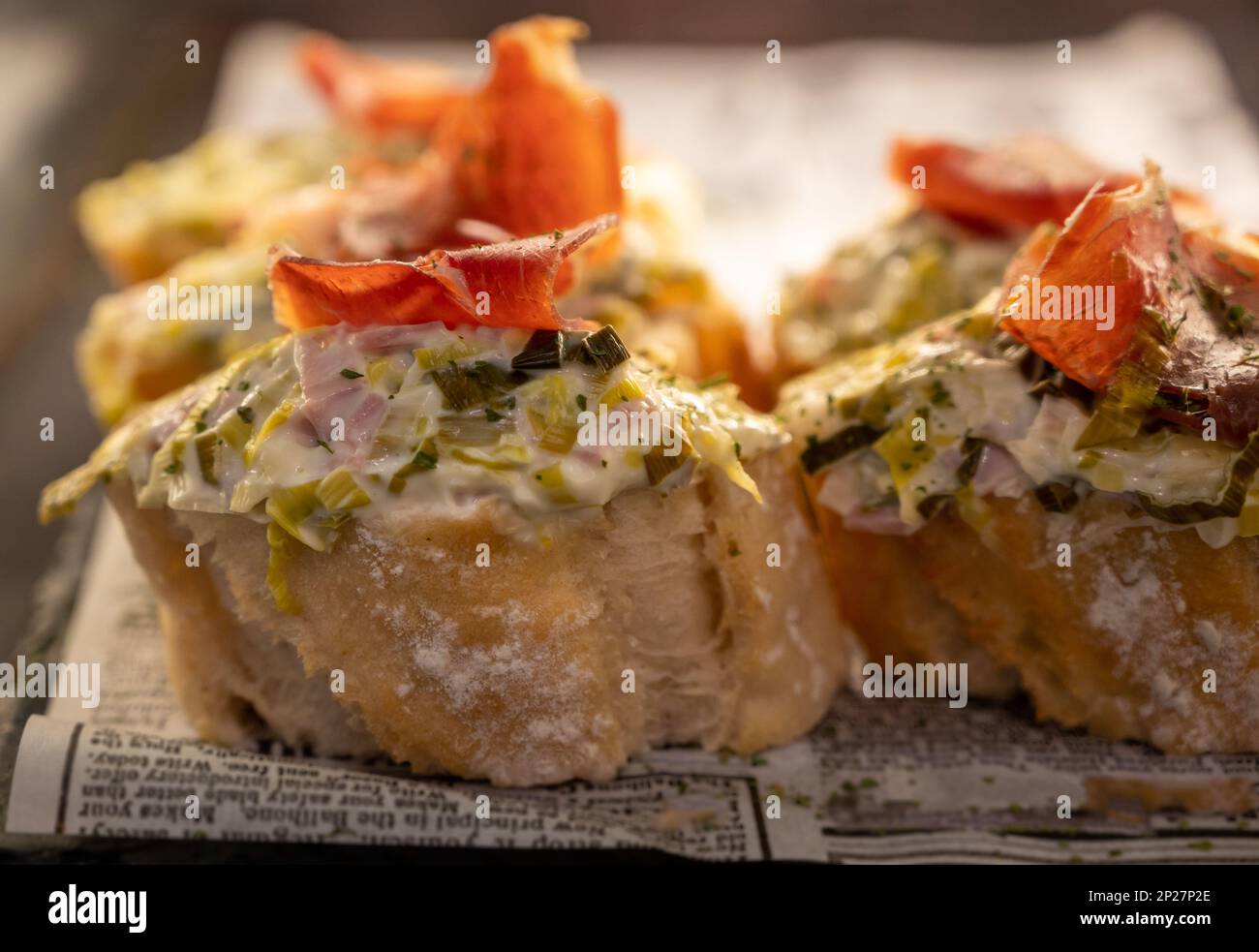 Typical snack of Basque Country, pinchos or pinxtos skewers with small ...