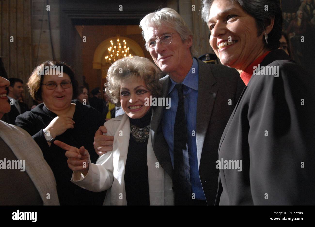 Annette Lantos, wife of Rep. Tom Lantos, poses for a picture with actor ...