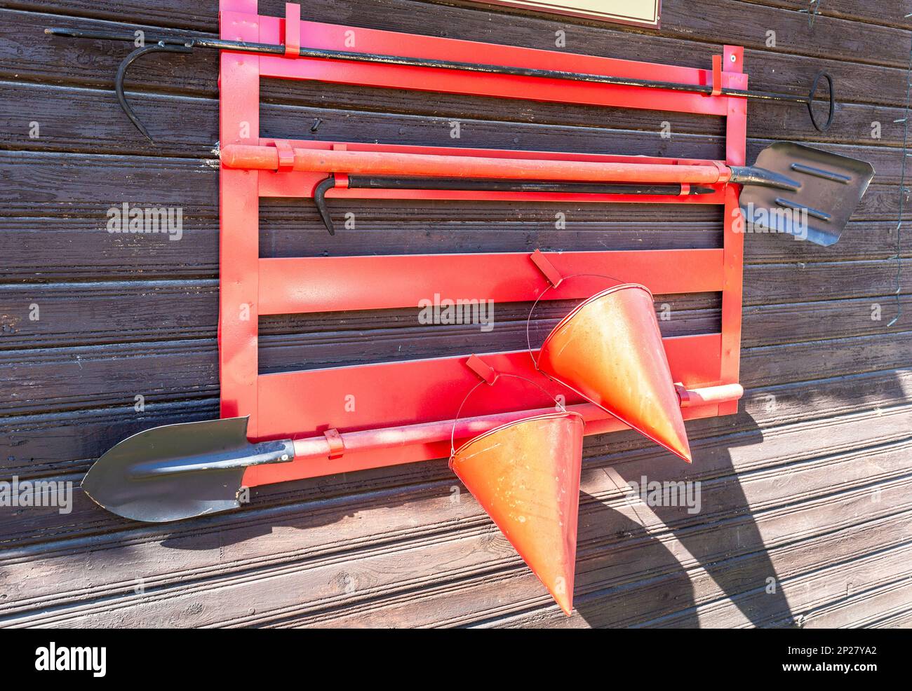 Fire safety shield with a tool for firemen: buckets, shovel, scrap ...