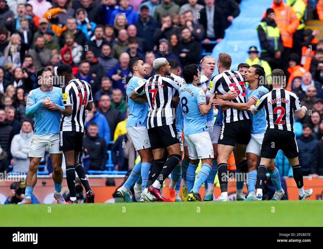 Tempers flare between Newcastle United's Dan Burn and Manchester City's ...