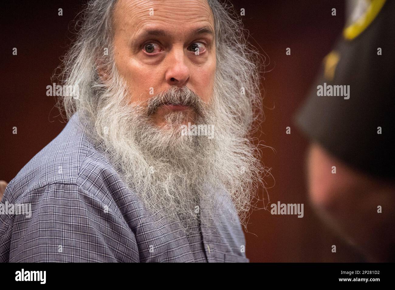 Charles Severance is taken into the courtroom after a recess as he ...