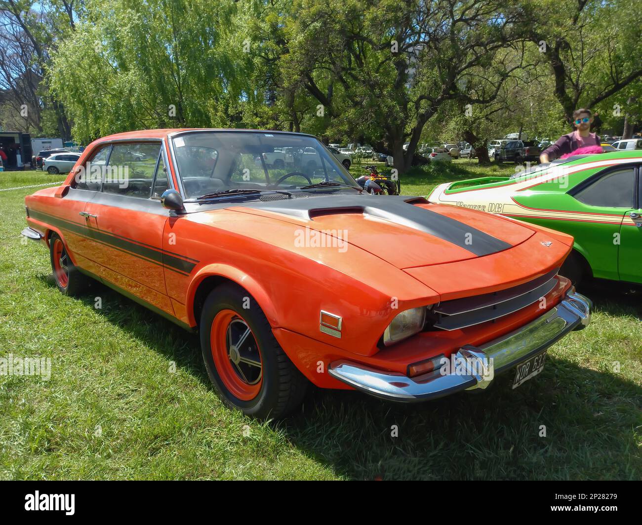 Old orange 1970s IKA Renault Torino Lutteral Comahue sport coupe in a ...