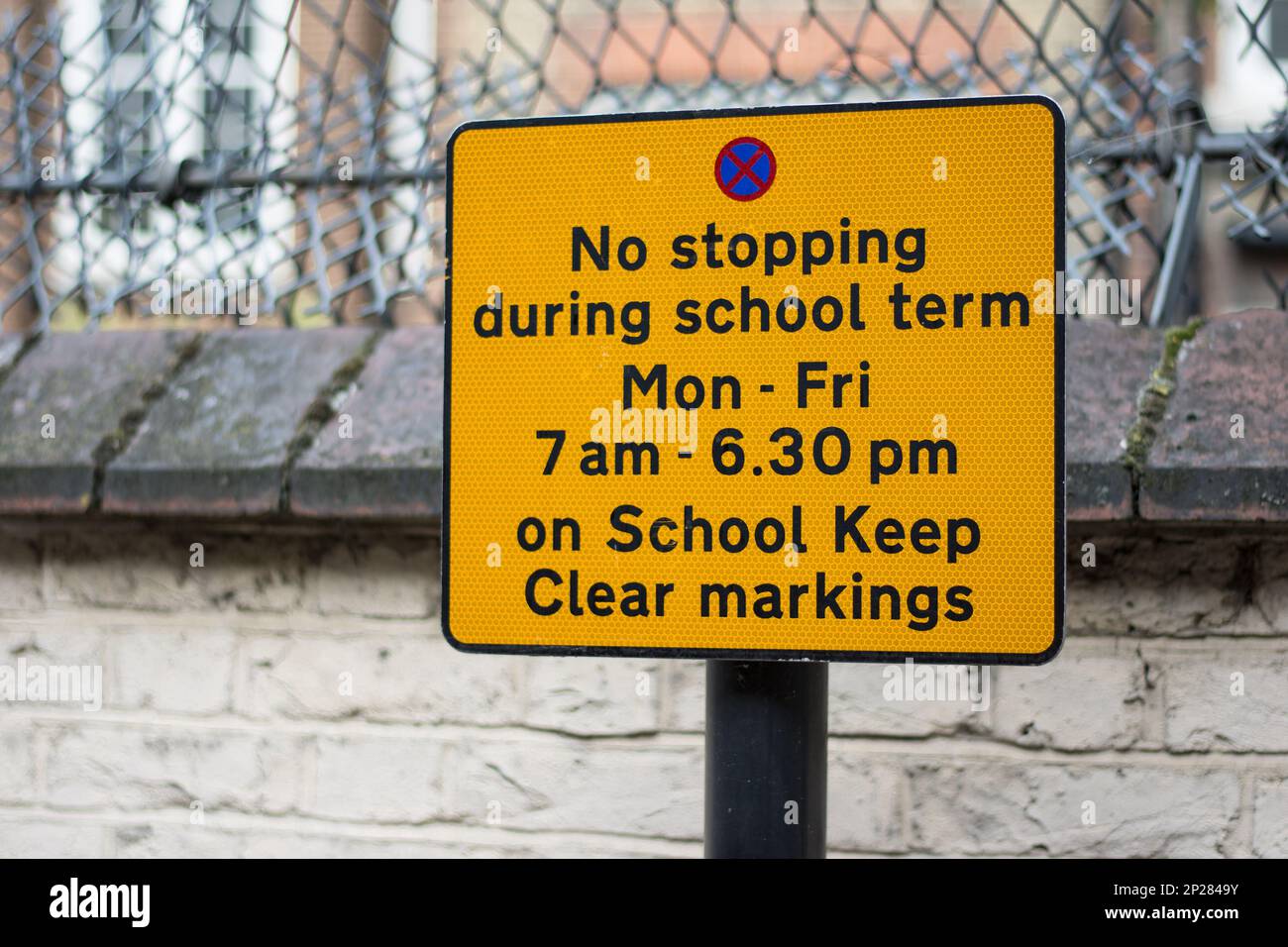 A road sign on a street in London, UK tells drivers not to park outside ...