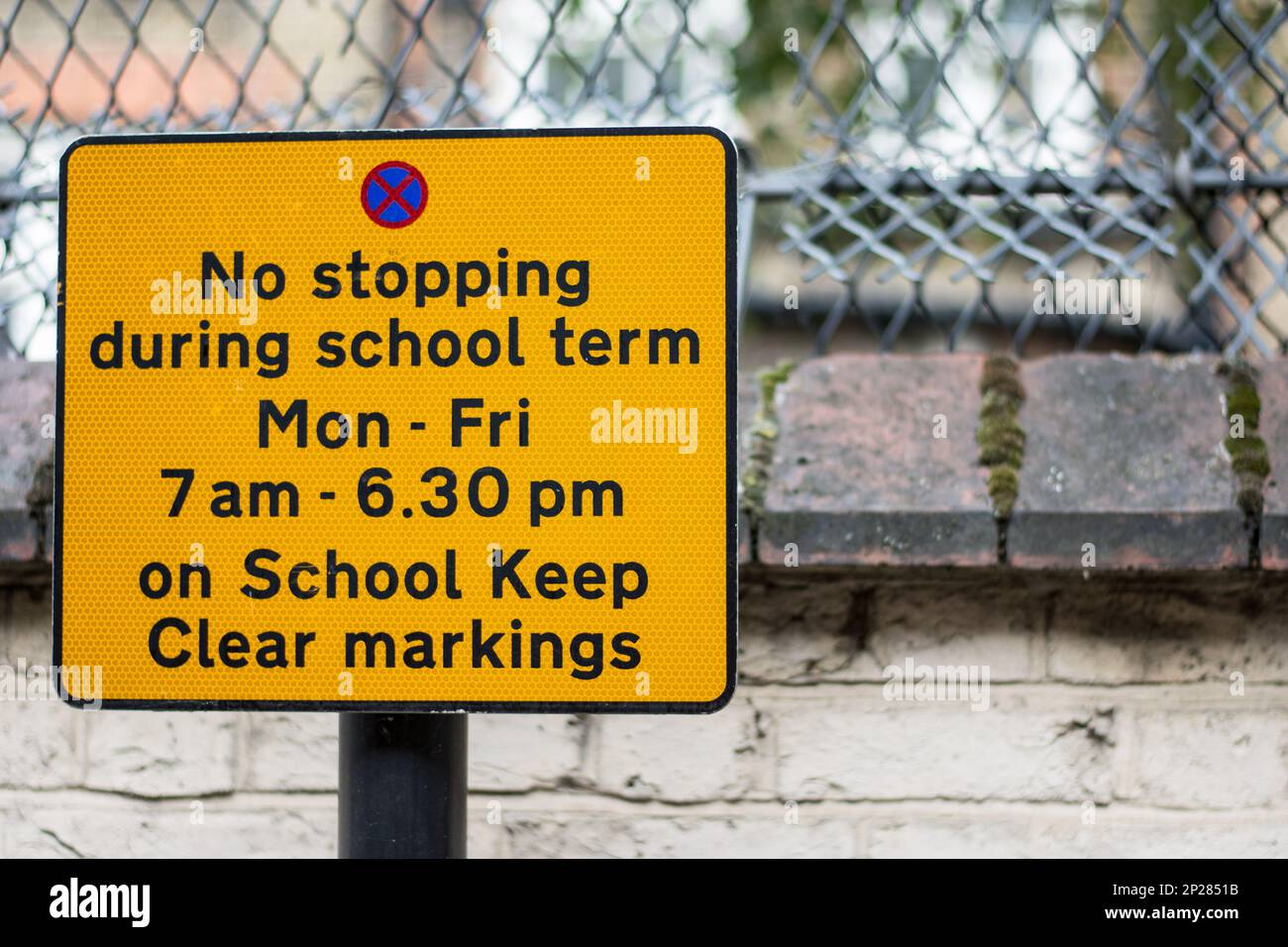 A road sign on a street in London, UK tells drivers not to park outside ...