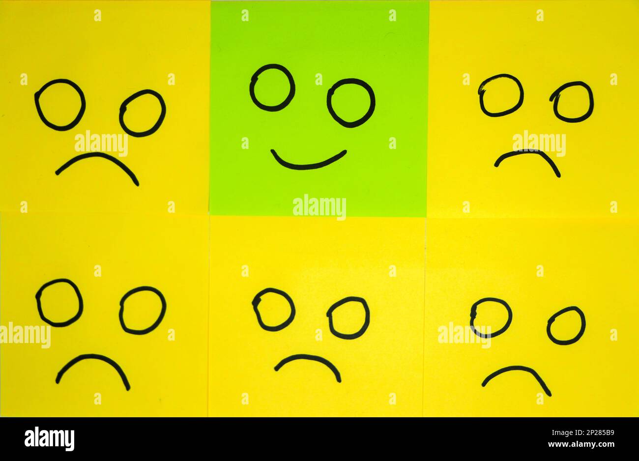 Emotions concept. Background of sticky notes. Green sticky note is ...