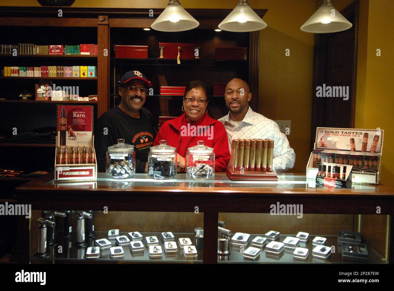 Ronald Wright, right, owner of Capitol Hill Premium Cigars & Tobacco on ...