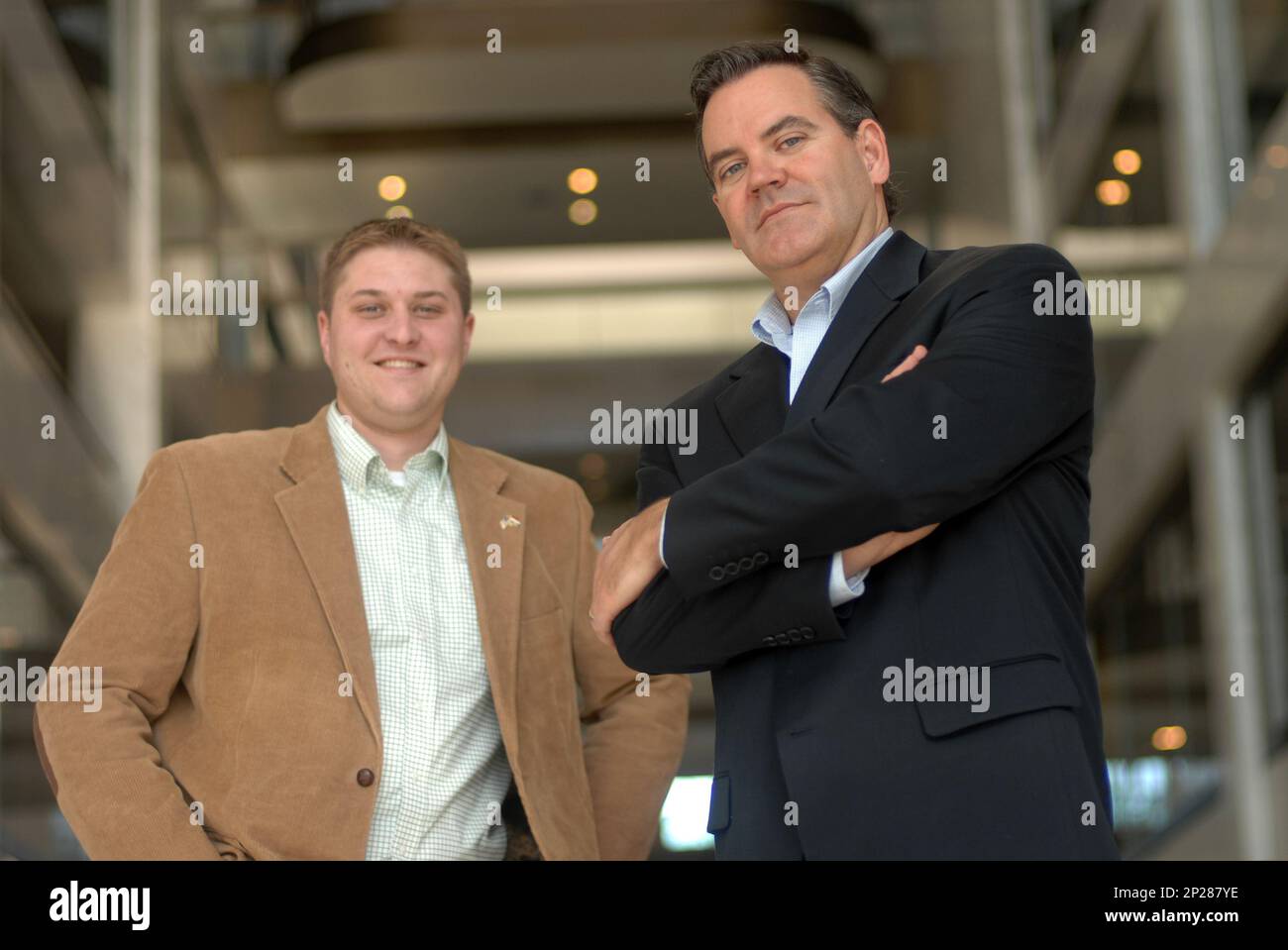 Climbers Ryan Taylor, left, and Gregory Keeley, from the office of Sen ...