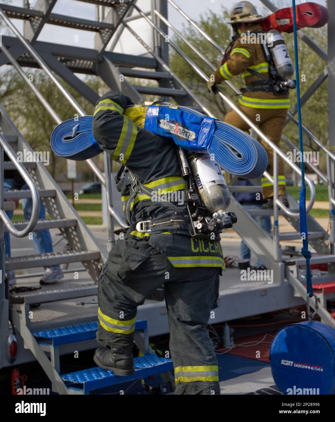 Firefighters start the tower climb during the Firefighter Combat ...