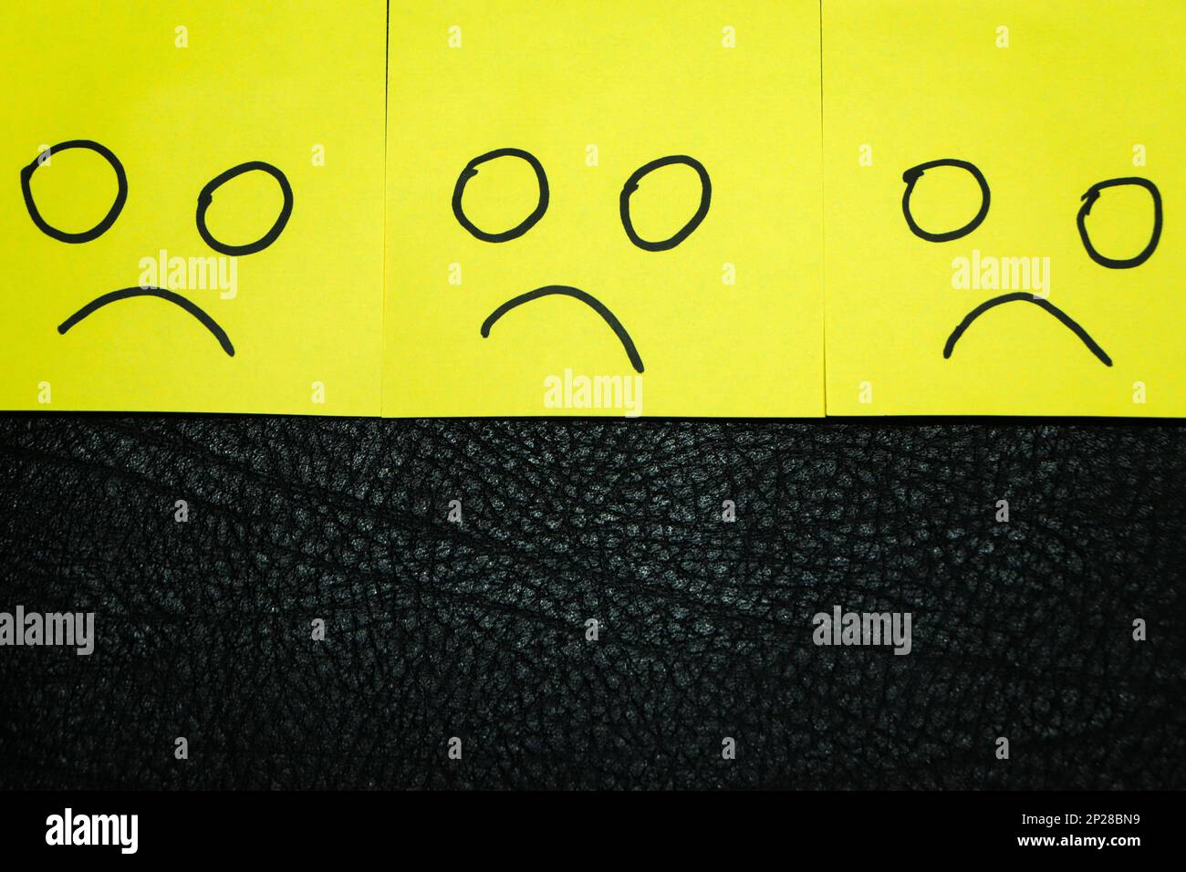 Emotions concept. Background of sticky notes. Green sticky note is ...