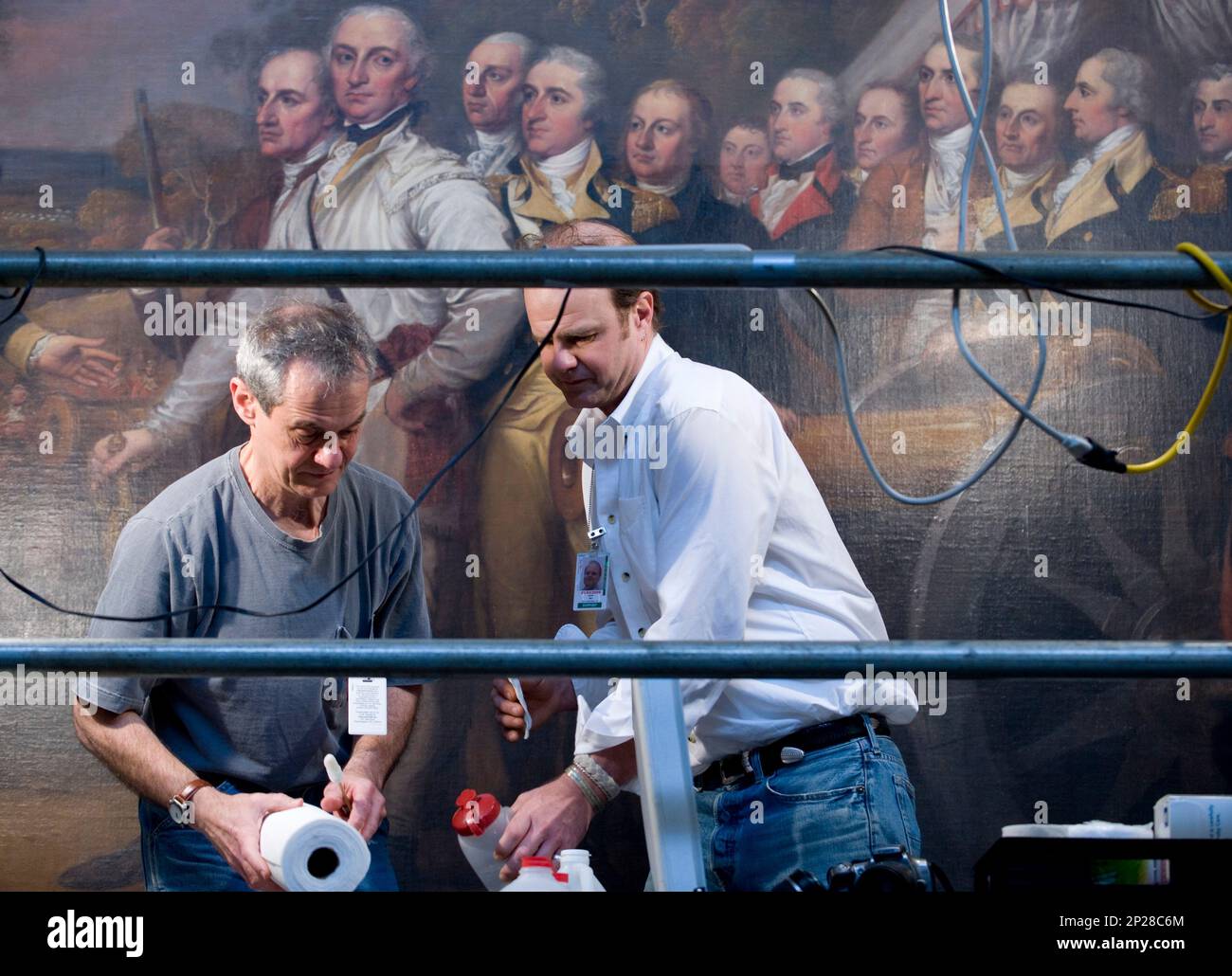 Larry Keck, a conservator with Olin Conservation, and David Olin, owner ...