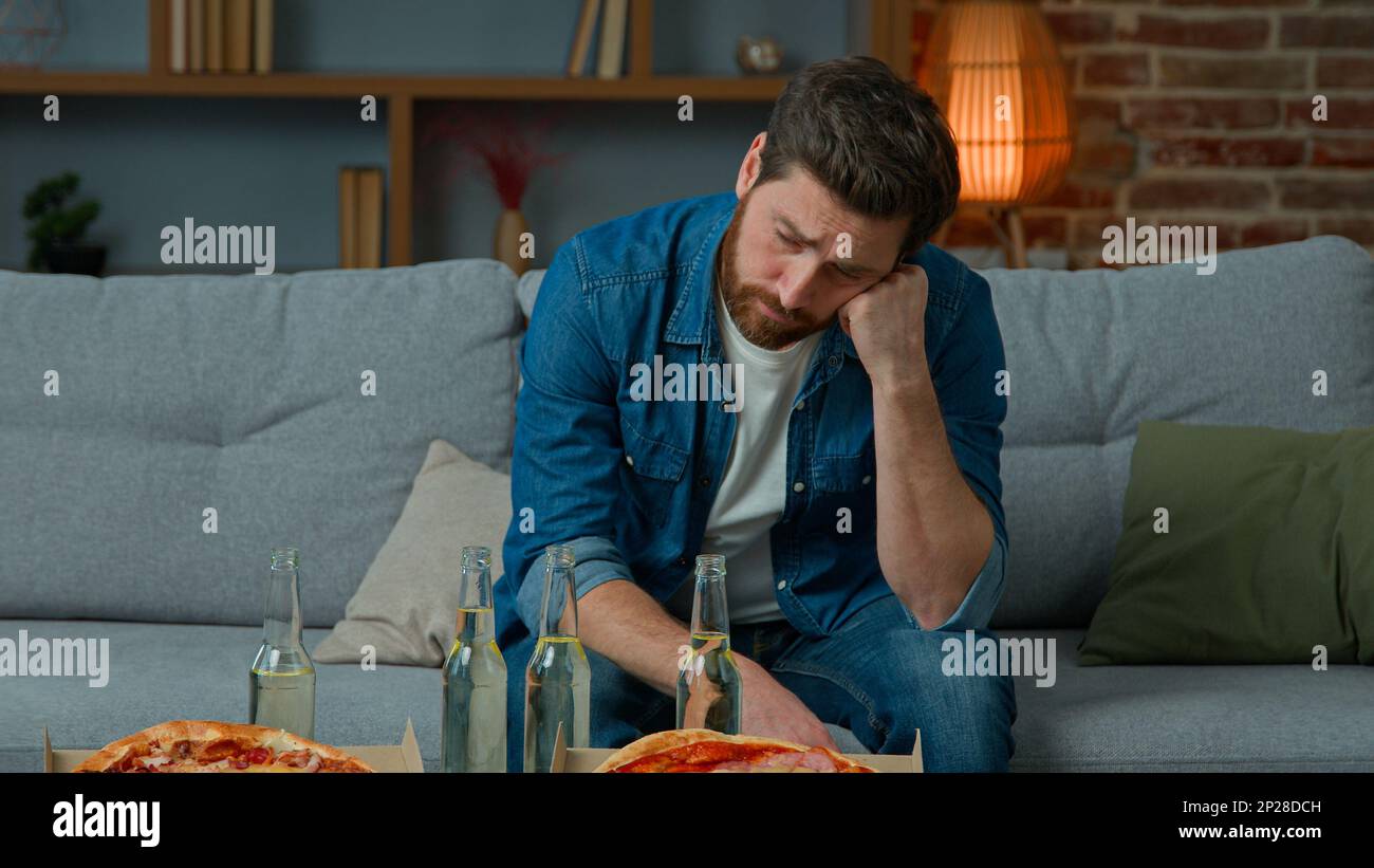 Sad man sit table alone hi-res stock photography and images - Alamy