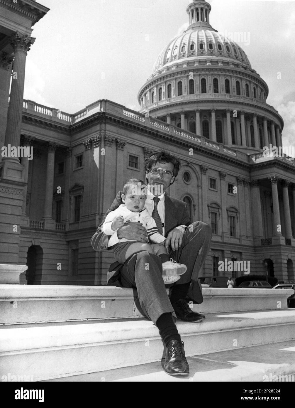 David Sims, a House photographer, is pictured with his son Aidan, now a ...