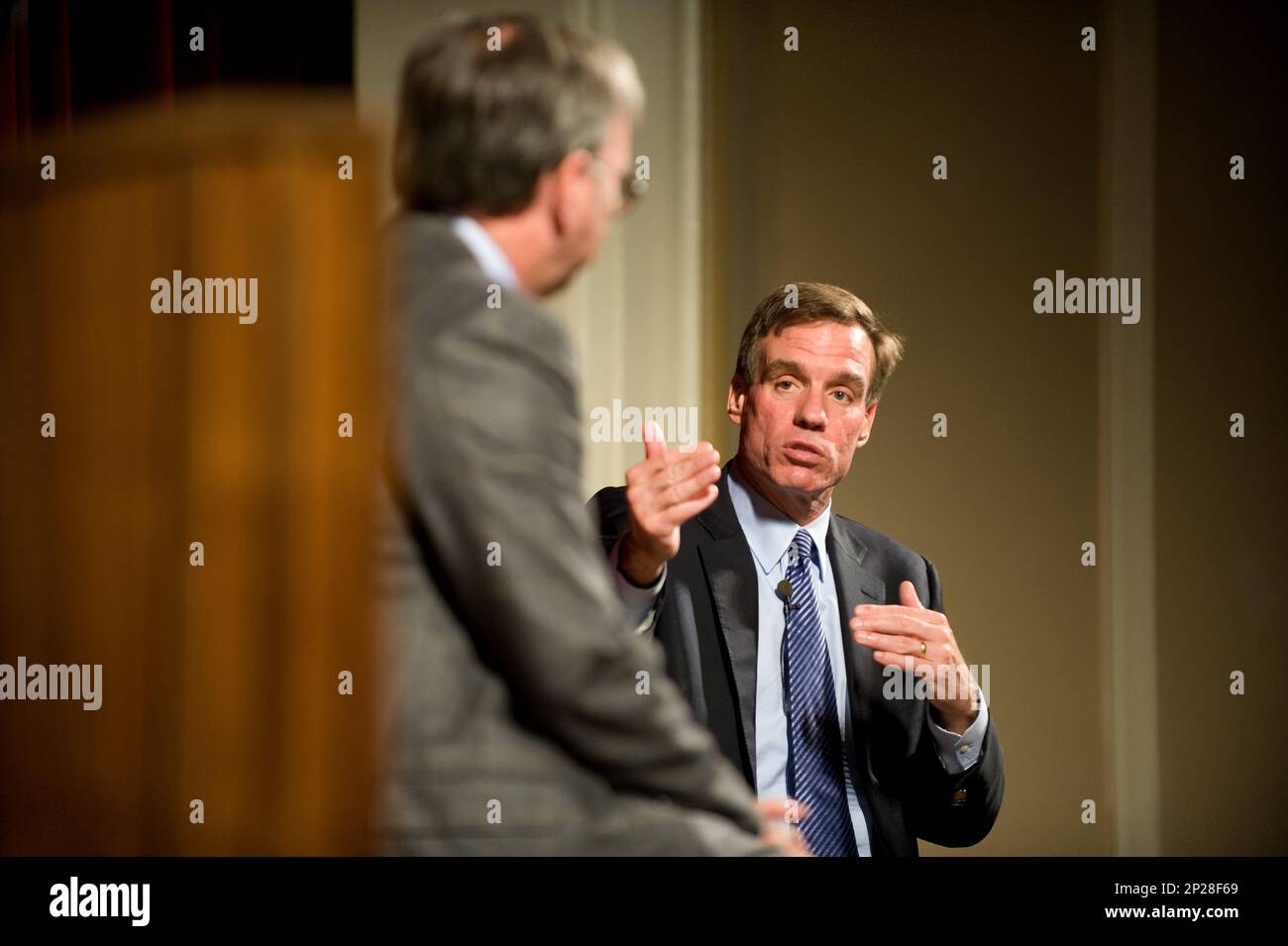 Former Governor of Virginia Mark Warner listens to Eric E. Schmidt the ...