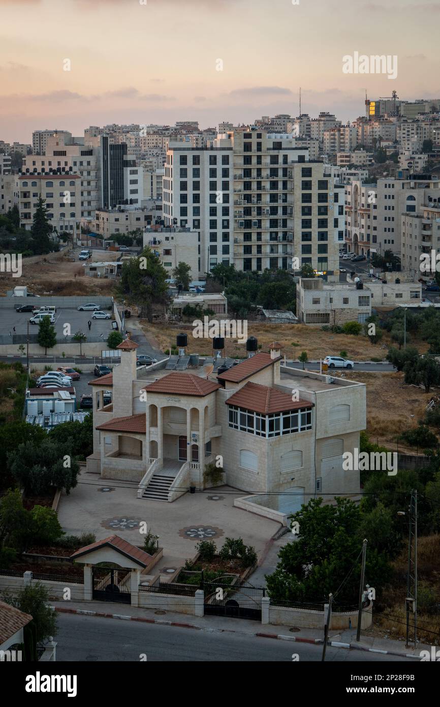 Ramallah Cityscape at Dawn with Sunset, High Buildings and Trees Facing ...