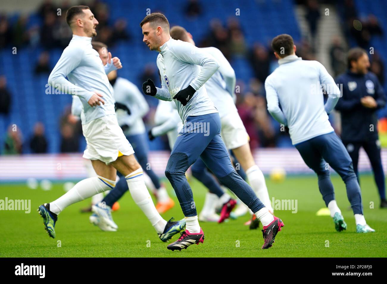 Brighton and Hove Albion players warming up prior to kick-off before ...