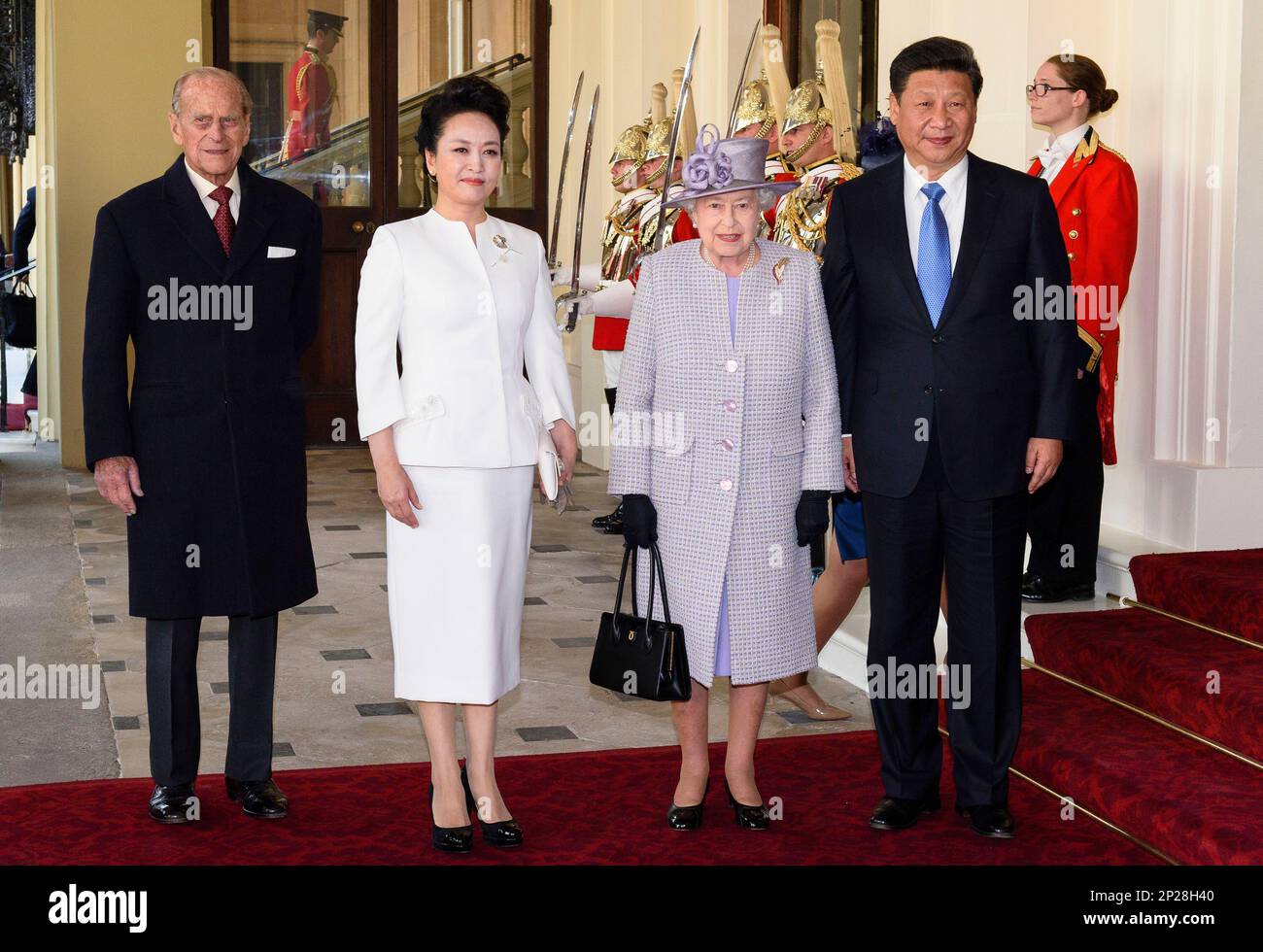 From left, the Duke of Edinburgh, China's first lady, Peng Liyuan ...