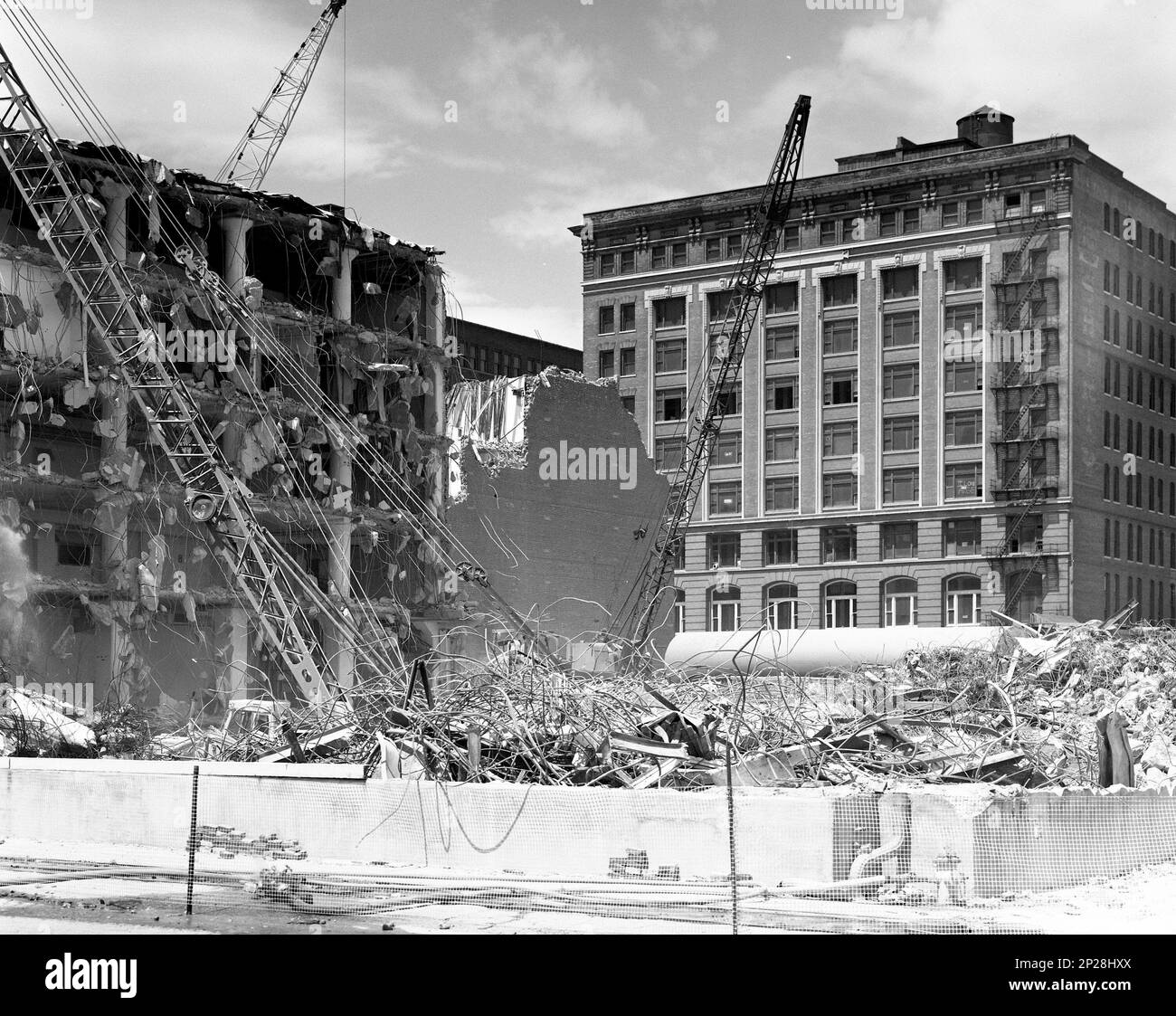 In this photo from 1988, the D.H. Foods building is torn down in Omaha ...